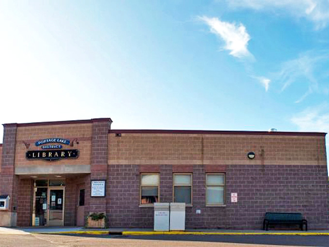The Portage Lake District Library stands ready to welcome visitors and locals alike, offering knowledge, community programs, and a touch of local culture.