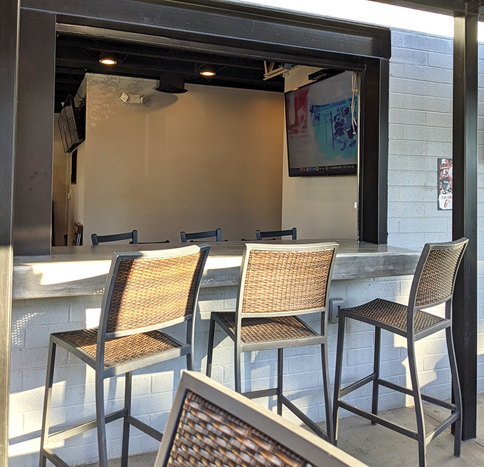 Counter seating that invites solo diners to enjoy the show &ndash; where food prep becomes performance art.