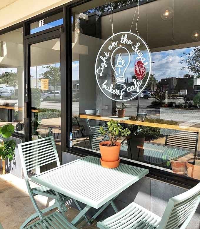 The mint-green outdoor patio furniture practically whispers, "Stay awhile and enjoy that cream puff in the Florida sunshine."