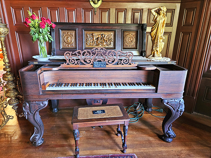 This isn't just an antique piano – it's a time machine to evenings when entertainment required actual talent instead of just a good WiFi connection.