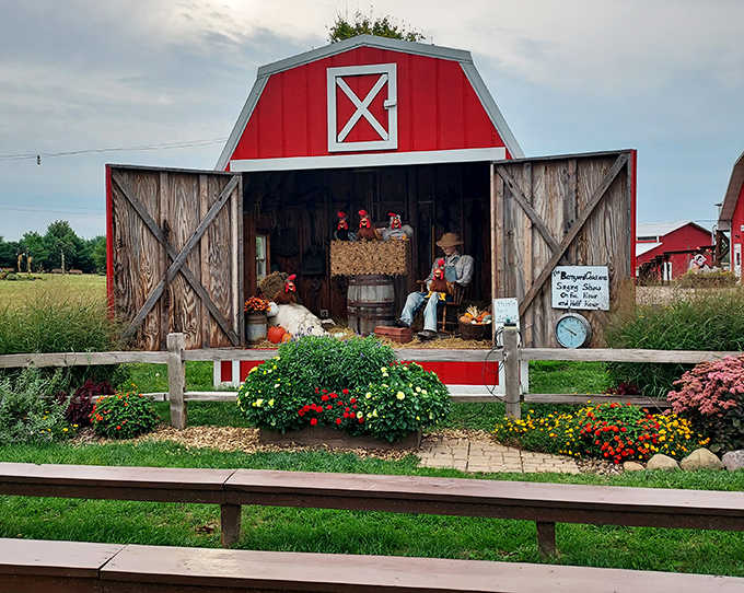 The classic red barn stands as a cheerful sentinel over seasonal festivities &ndash; Norman Rockwell would definitely approve.