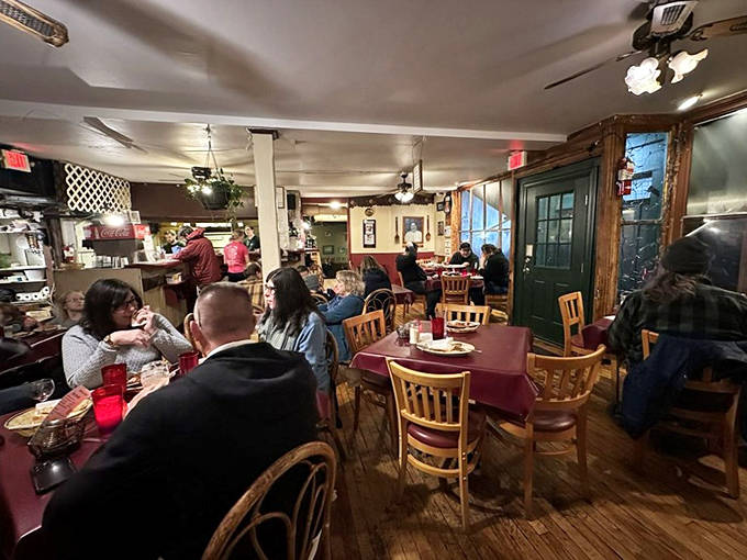 The dining room buzzes with the beautiful symphony of clinking glasses and satisfied murmurs. Every table tells a different story.