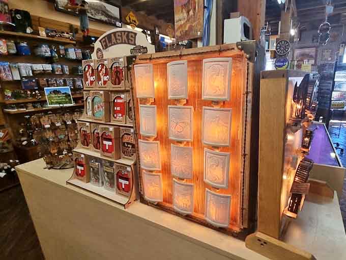 Illuminated display cabinets cast a warm glow on special treasures, creating little spotlights of wonder that draw you deeper into this mercantile's endless collection of goods.