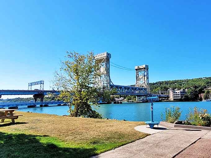 The world's heaviest lift bridge stands as Houghton's iconic landmark, its massive towers framing a perfect view of the town's waterfront charm.