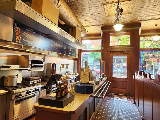 Where the magic happens &ndash; the open kitchen layout lets diners watch their comfort food classics being prepared with practiced hands and time-honored techniques.