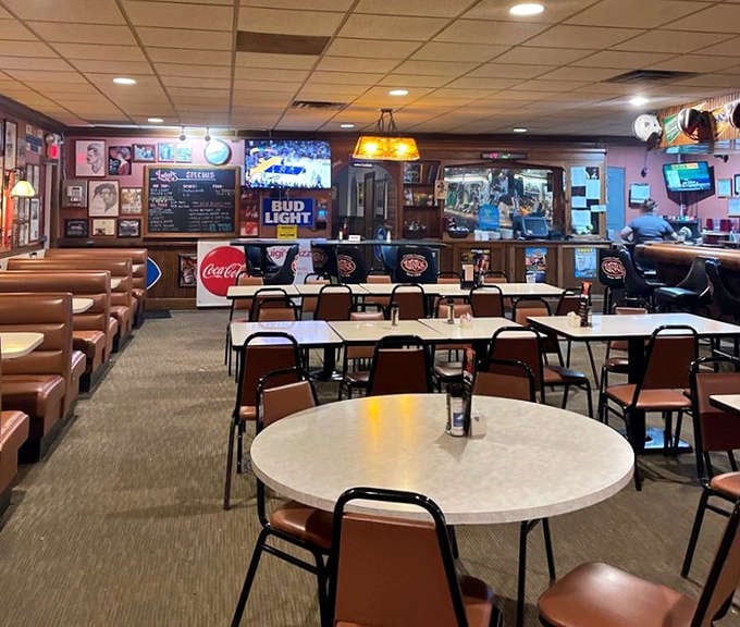 Simple tables and chairs create an unpretentious dining space where the food, not fancy decor, remains the undisputed star.