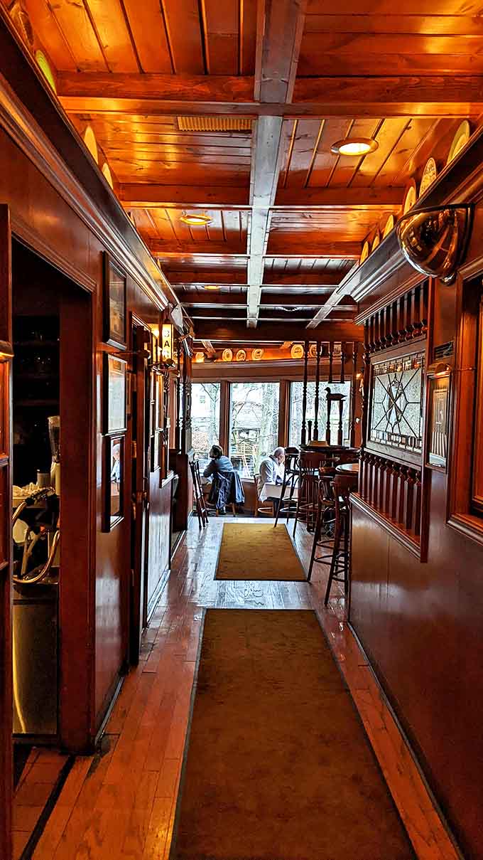 Warm wooden hallways guide you through this dining sanctuary, where every corner feels like a discovery worth making.