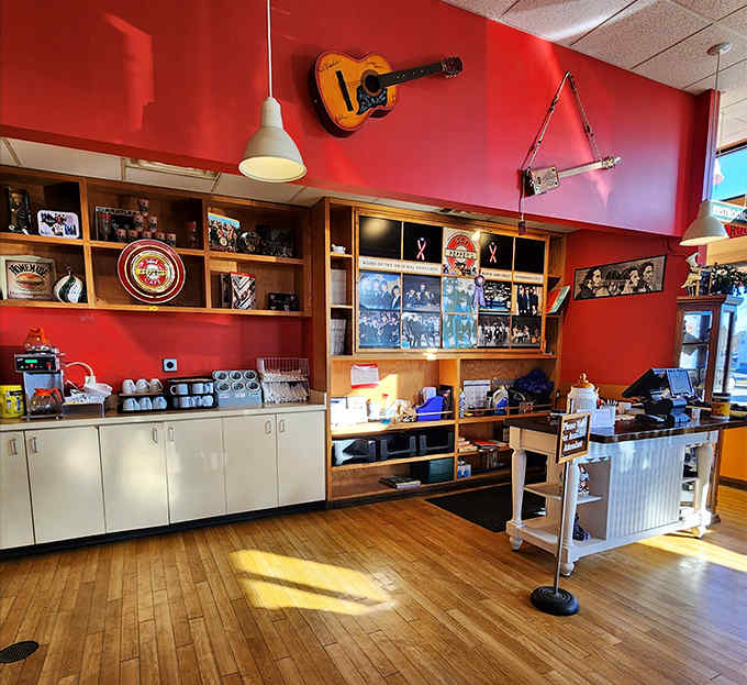 The warm interior of Sgt Peppers Cafe features Beatles album art, memorabilia, and a color scheme that would make John, Paul, George, and Ringo feel right at home.