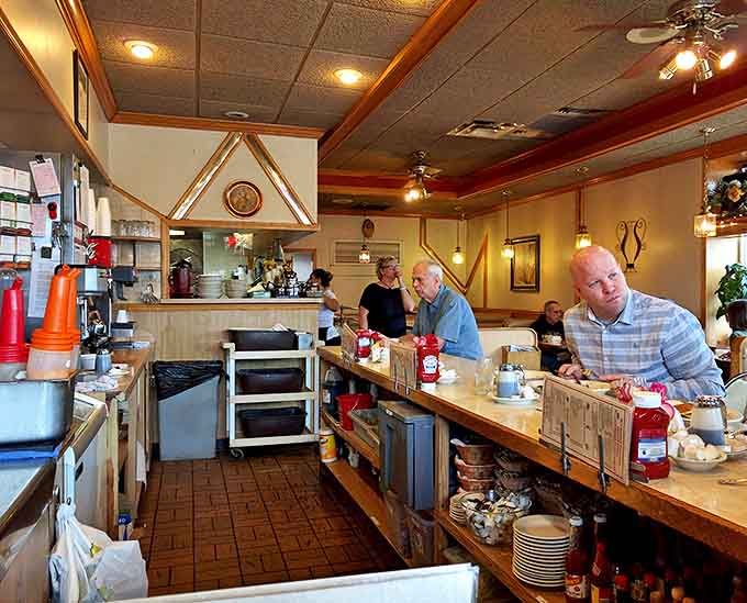 Morning regulars line the counter, participating in a Chicago tradition as timeless as complaining about the weather or defending deep dish pizza to out-of-towners.