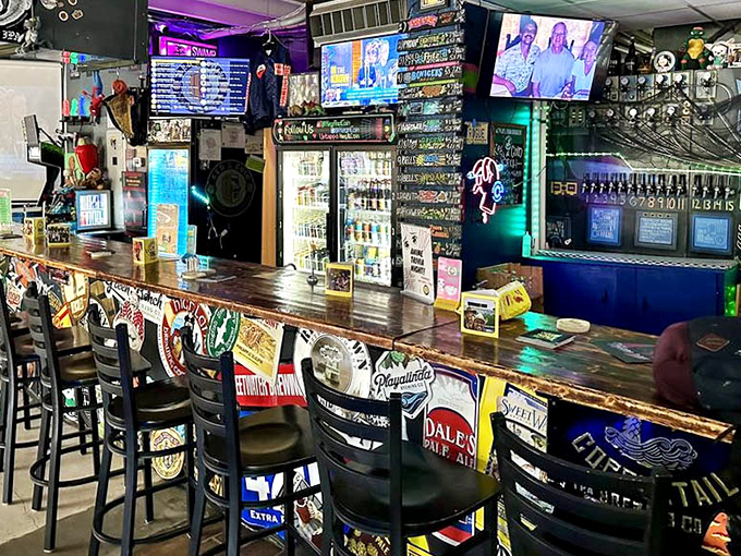 The bar's wooden countertop bears witness to countless gaming tales, while the impressive tap selection promises liquid courage for your next high score attempt.