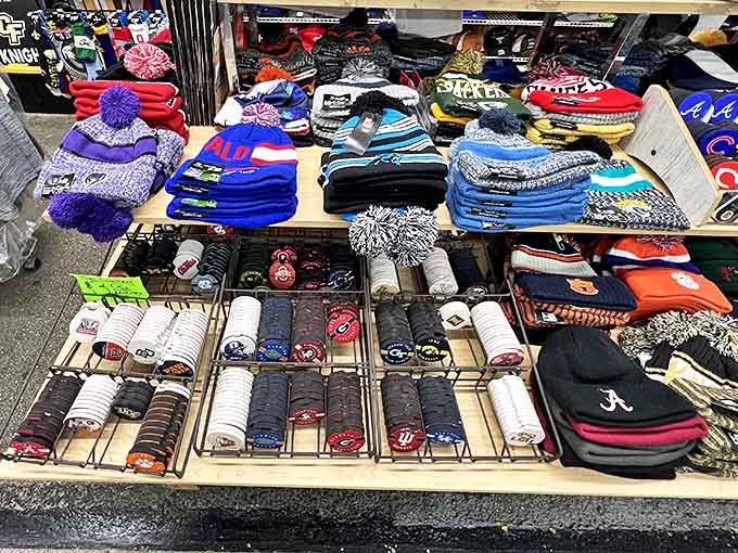 Team spirit on display &ndash; because nothing says "dedicated fan" like a purple pompom beanie in 90-degree Florida heat.