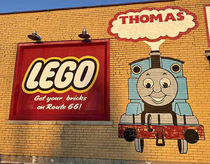 That LEGO mural and Thomas painting announce loud and clear: this is where fun lives, and everyone's invited inside.