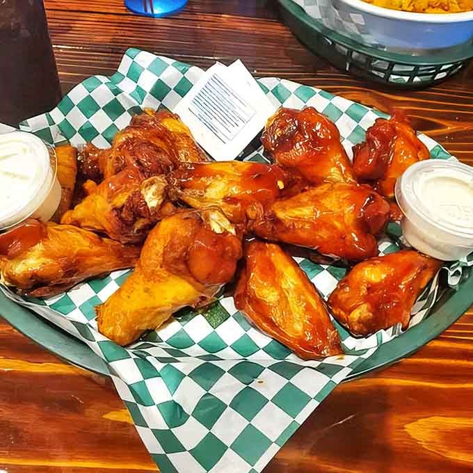 Wings that achieve the holy grail of buffalo perfection: crispy exterior, juicy interior, and sauce that balances heat with flavor.
