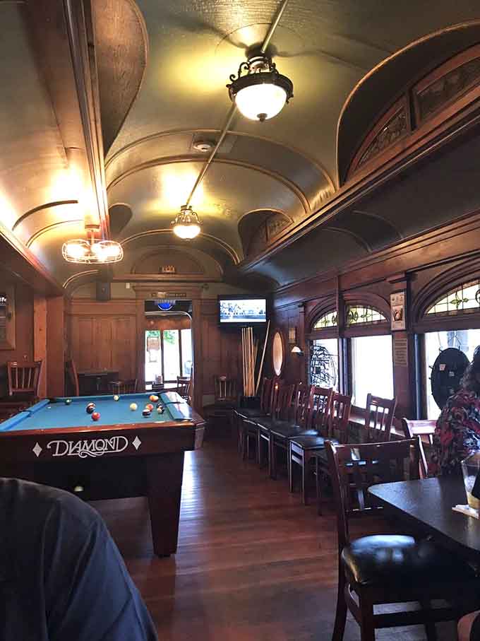 A pool table adds entertainment to the dining experience, making this a true community gathering spot.