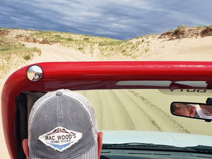 Through the windshield lies adventure – each dune a new mountain to conquer, each descent a moment of pure, childlike joy.