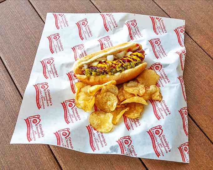 Even the humble hot dog gets the gourmet treatment here, topped with house-made condiments and served alongside kettle chips.