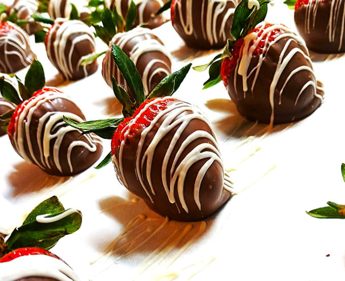 Fresh strawberries get the chocolate treatment they deserve, proving fruit can absolutely be dessert when properly dressed.