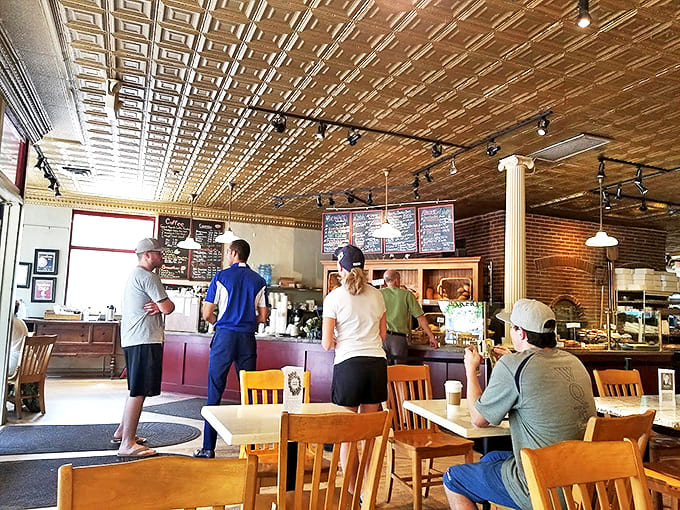 The bakery buzzes with the energy of satisfied customers plotting their next visit while still finishing their current feast.