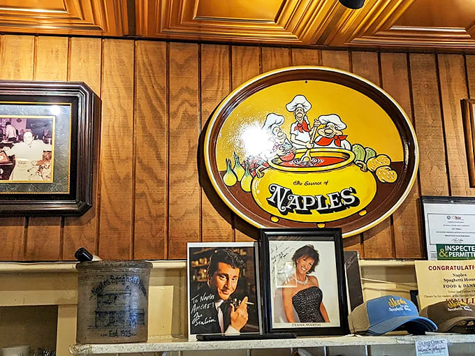 "The Secrets of Naples" sign and vintage photographs invite you into a continuing story that stretches back through time.