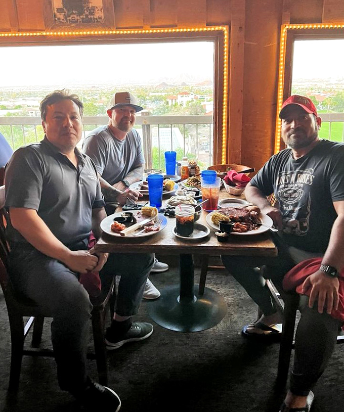 Happy diners with plates that could feed a small ranch &ndash; the Rustler's Rooste portion control philosophy is "more is more."