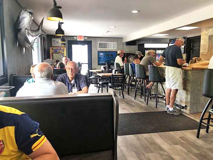 Where food challenges become spectator sports and memories are made one enormous sandwich at a time. That tower of deliciousness could qualify as an architectural achievement.