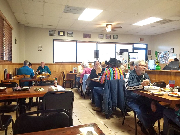 A dining room bathed in natural light where conversations between strangers often break out &ndash; the hallmark of a true community gathering spot.