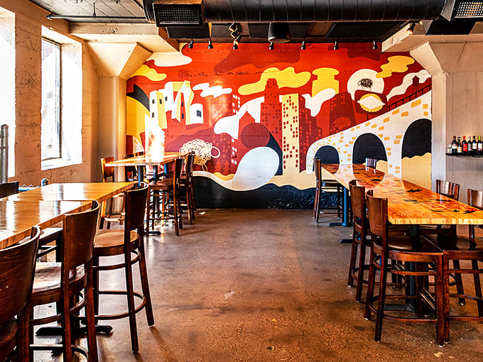 The dining room balances rustic charm with urban comfort&mdash;where sunlight streams through windows illuminating tables of people having religious experiences with breakfast.