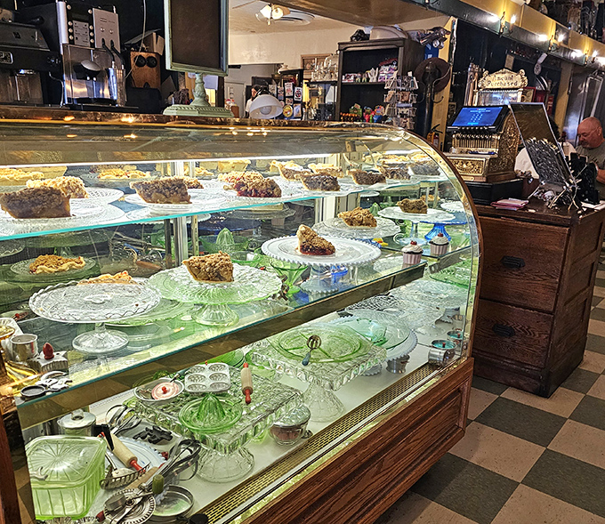 A glass-fronted gallery of temptation showcasing homemade pies and treats that make willpower utterly useless.