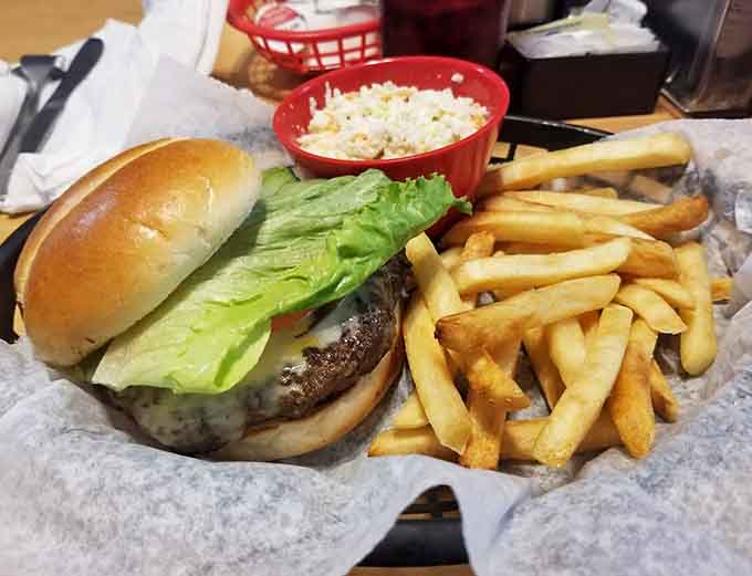 A classic burger with lettuce, tomato, and fries proves that sometimes simple done right beats complicated done wrong.