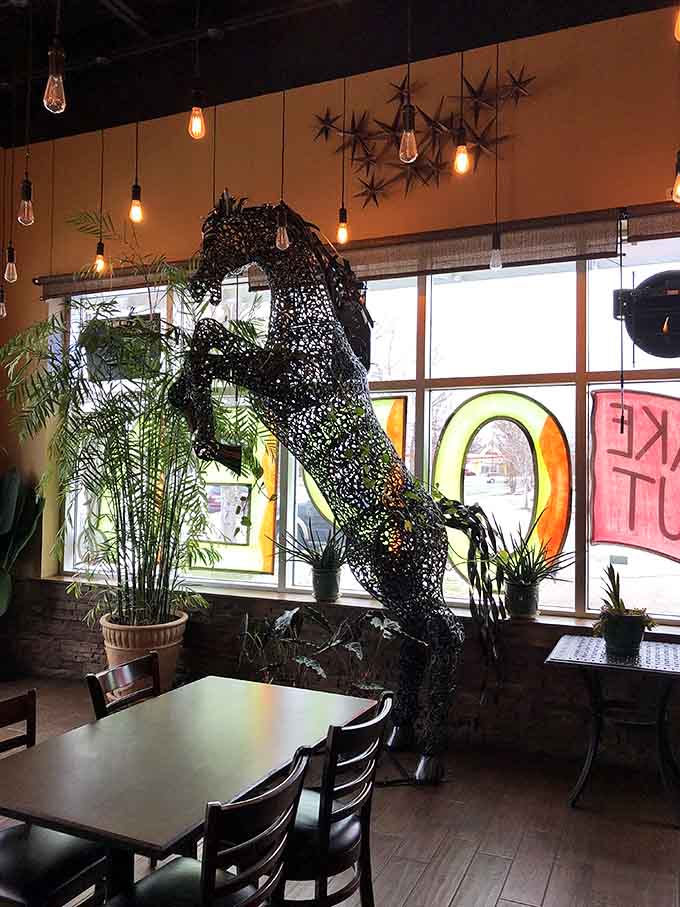 That metal horse sculpture adds artistic flair while you contemplate whether you have room for dessert (you do).
