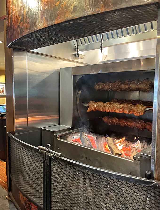 The wood-fired rotisserie does the heavy lifting, slowly turning out perfectly cooked meats with that signature smoky flavor.