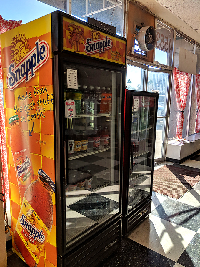 The Snapple fridge stands ready, because even the sweetest tooth occasionally needs something to wash down all that sugary glory.