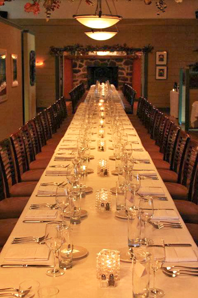 The private dining room, set for a special gathering, promises memorable celebrations where food becomes the centerpiece of shared joy.