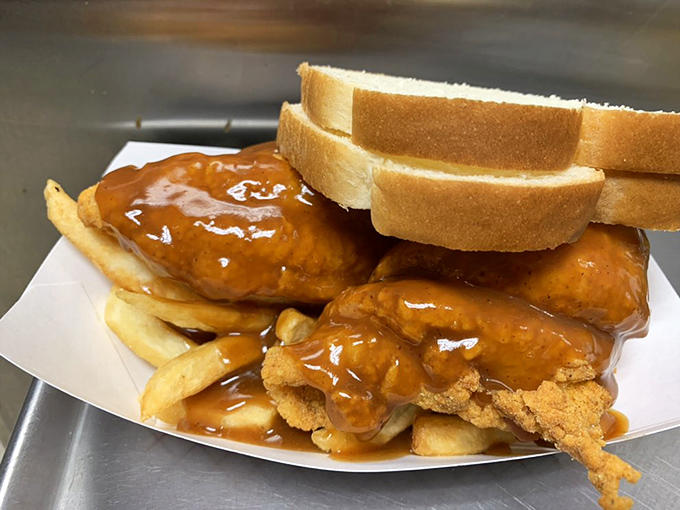 Fried fish with a golden crust that shatters on contact, revealing flaky perfection within. A welcome seafood interlude in meat country.