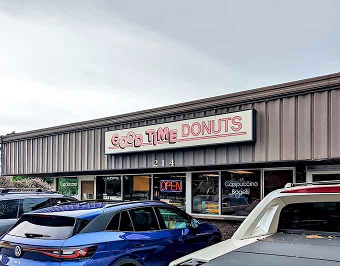 The universal language of donut selection: point, nod, smile, repeat. Choosing is the hardest part of the Good Time Donuts experience.