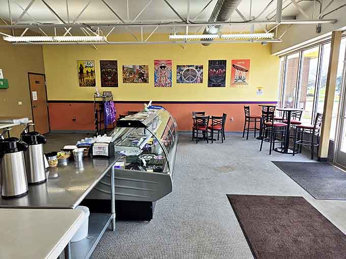 The dining area where strangers become friends over shared appreciation for exceptional fried dough and strong coffee.