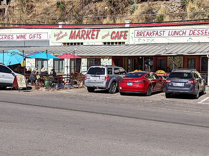 High Desert Market and Cafe offers shaded outdoor seating where visitors refuel with locally-sourced fare before continuing their Bisbee adventures.