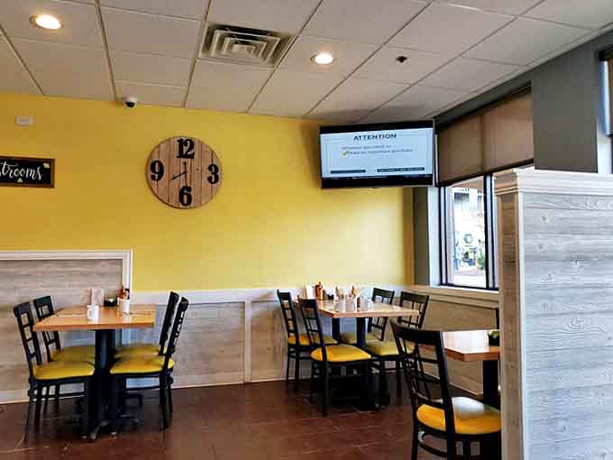 Clean lines, warm lighting, and comfortable seating create a space where lingering over coffee feels not just acceptable but encouraged.