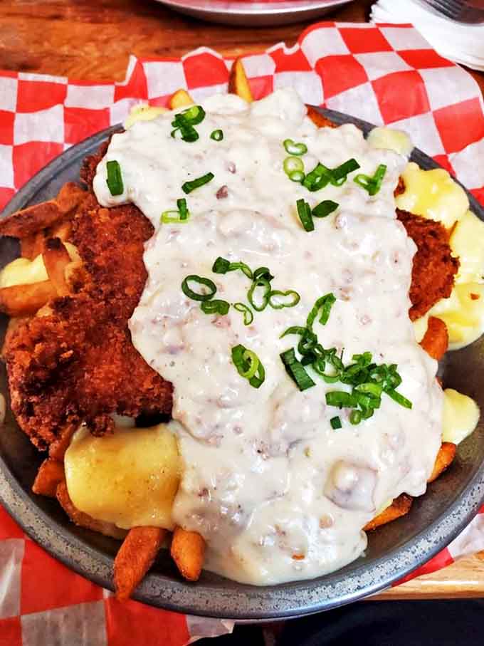 The Hungry Boy Poutine doesn't mess around&mdash;fries smothered in gravy, cheese, and fried chicken create a dish that demands a post-meal nap.