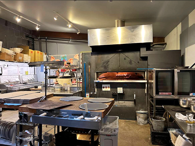 The heart of Folino's operation &ndash; where wood-fired magic happens daily in an oven that reaches temperatures that would make mere mortals wilt.