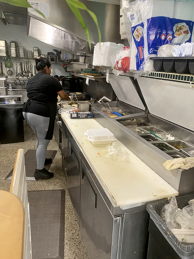 The engine room of flavor &ndash; spotless, efficient, and humming with the quiet confidence that comes from mastering traditional techniques.