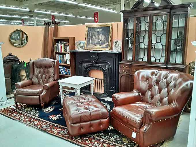 A leather furniture grouping creates a gentleman's club atmosphere. Don Draper would approve of this sophisticated corner for contemplating life's big questions.