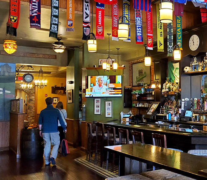 Sports jerseys and trophies decorate the walls, celebrating victories both local and international while screens keep you connected to the game.