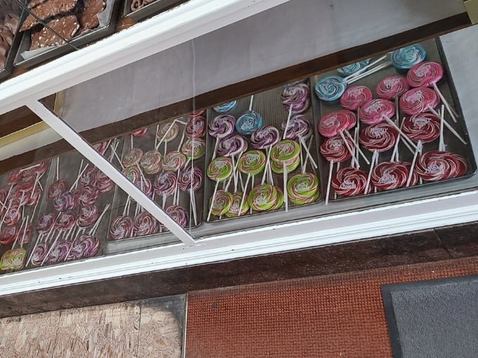 A rainbow of swirled lollipops brings childhood nostalgia rushing back with every colorful twist.