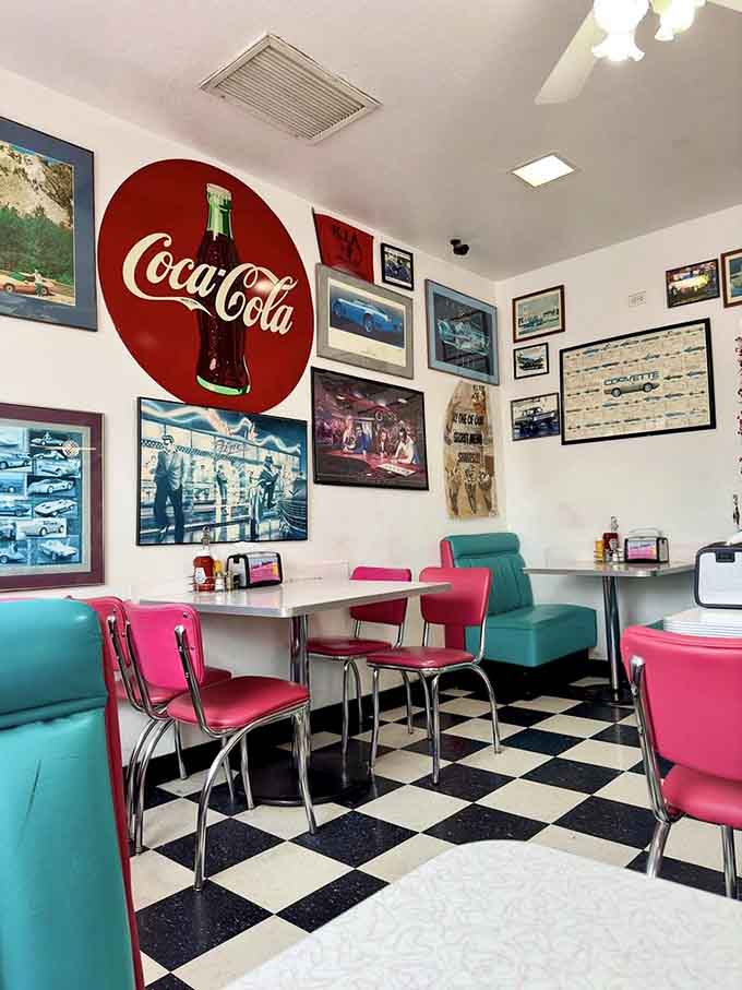 The walls tell stories of Route 66's golden age through carefully curated memorabilia and classic Coca-Cola charm.