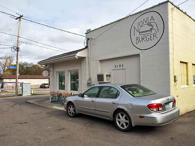 Outside Seating: The humble façade of burger greatness – where two benches offer the perfect spot to contemplate your next Nonla visit.