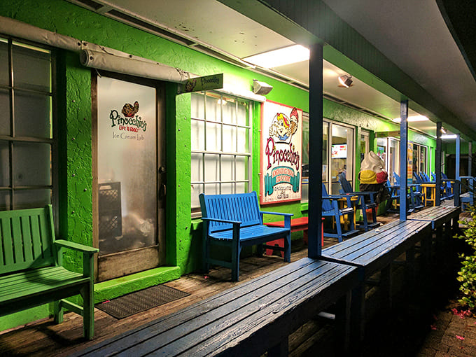 The outdoor seating area with weathered wooden decking and bright green umbrellas offers a perfect spot for savoring treats in the Florida sunshine.