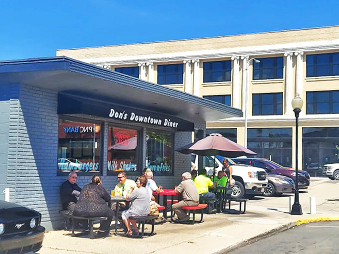 Classic diner booths invite you to slide in and stay awhile &ndash; the corrugated metal walls and wooden accents create the perfect backdrop for comfort food conversations.