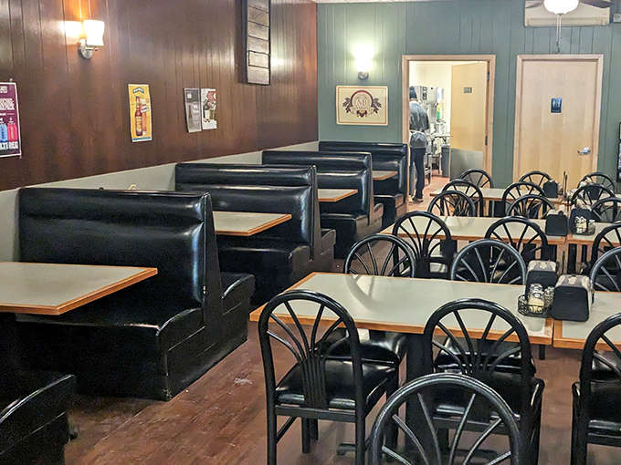 Classic booth seating offers cozy comfort for families and friends&mdash;these vinyl seats have witnessed countless celebrations and casual gatherings.