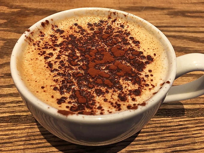 The peanut butter mocha &ndash; dessert masquerading as a morning beverage, topped with cocoa that nobody's complaining about disturbing.